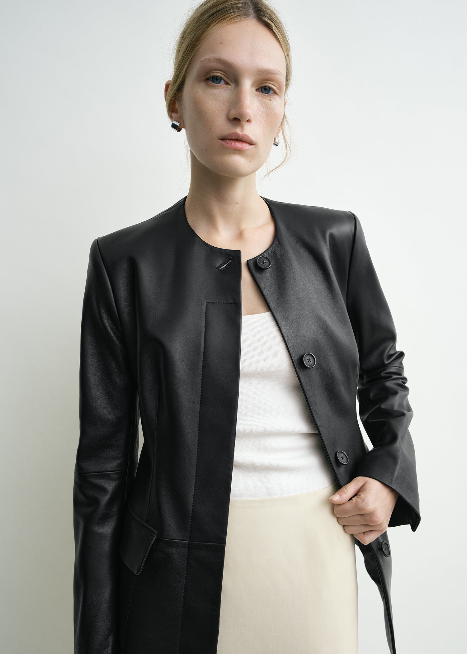 black leather collarless jacket